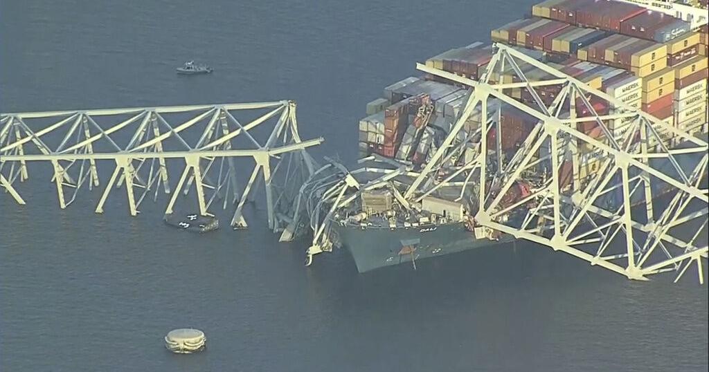 Cargo ship hits Baltimore's Key Bridge, bringing it down. Rescuers are ...