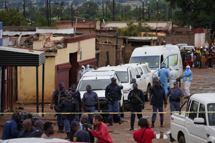 South African police continue arrests after mass shooting at a pub ...