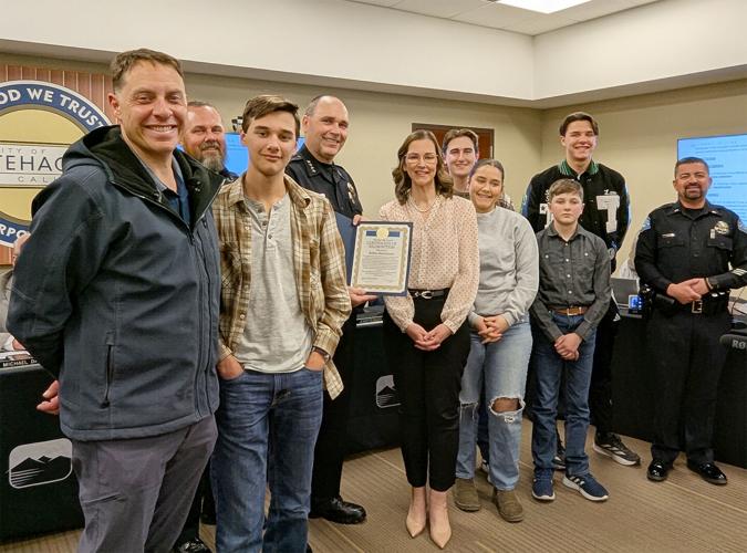 Dispatcher honored, two new police officers introduced at council ...