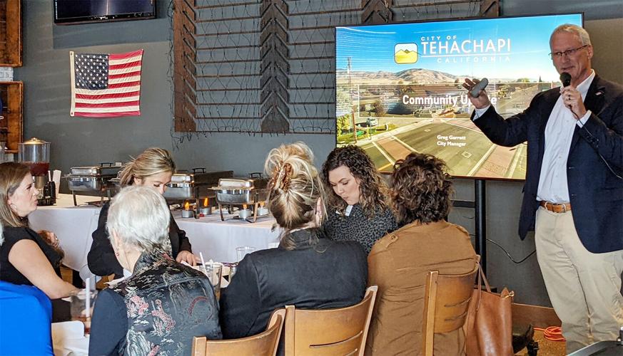 Chamber networking luncheon returns; attendees hear from city manager ...