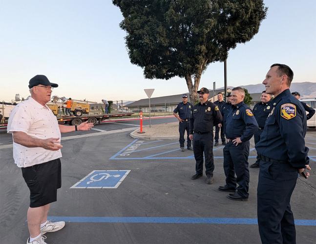 Firefighters gaining on two large wildfires as THS campus becomes a ...