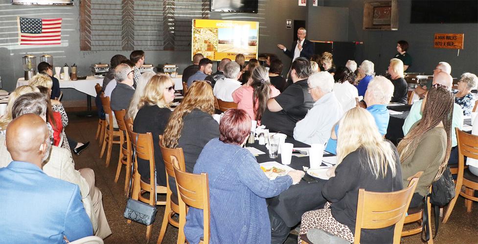 Chamber networking luncheon returns; attendees hear from city manager ...