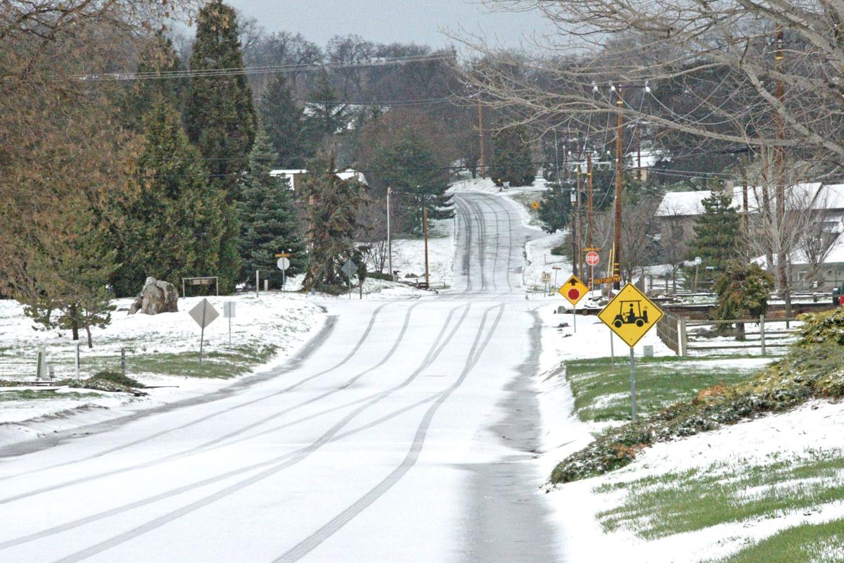 PHOTO GALLERY: It's spring, but a winter snowstorm sets in | News ...