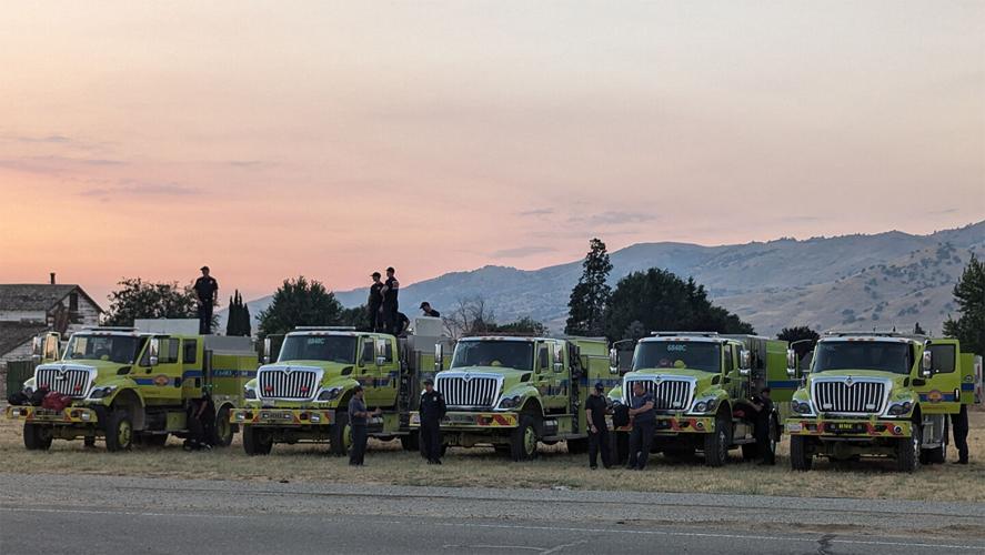 Firefighters gaining on two large wildfires as THS campus becomes a ...