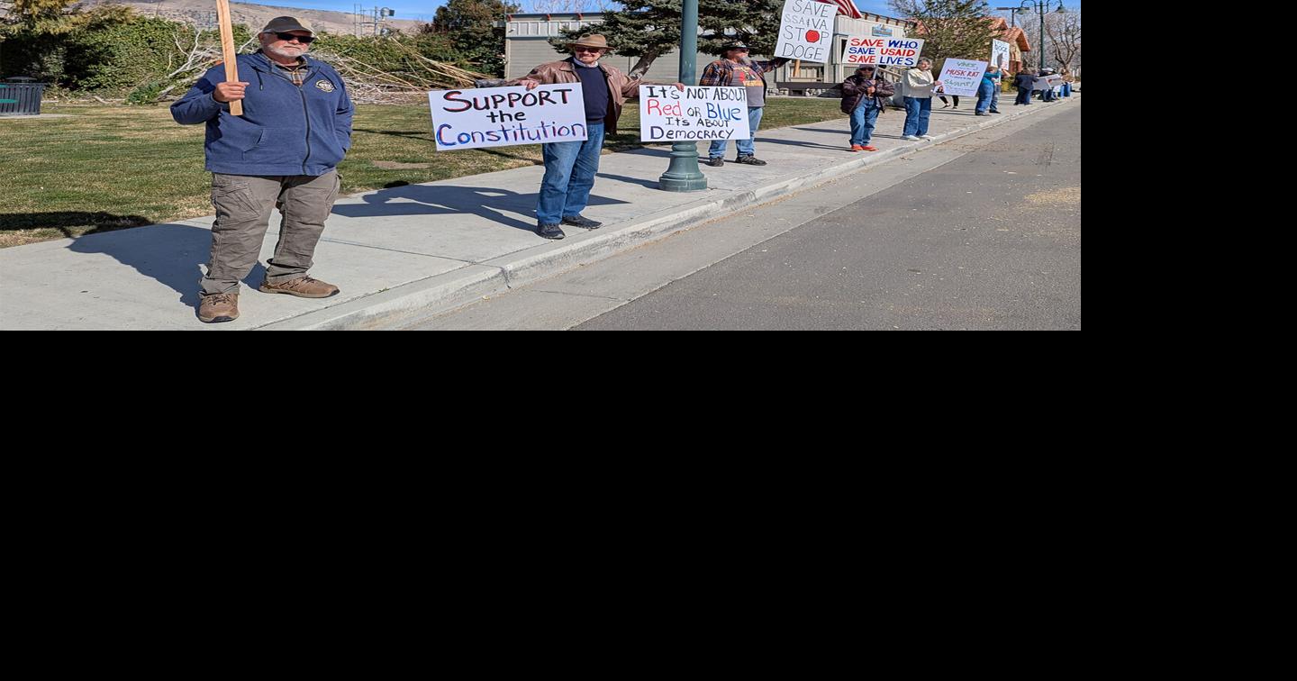 Area residents greet Fong’s representative with signs, questions | News ...