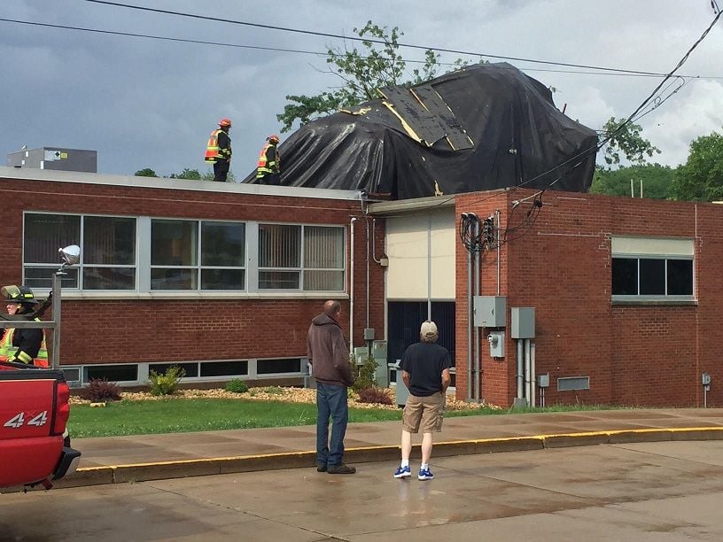 Update: Storm tears into Sageville School roof, cuts power and downs ...