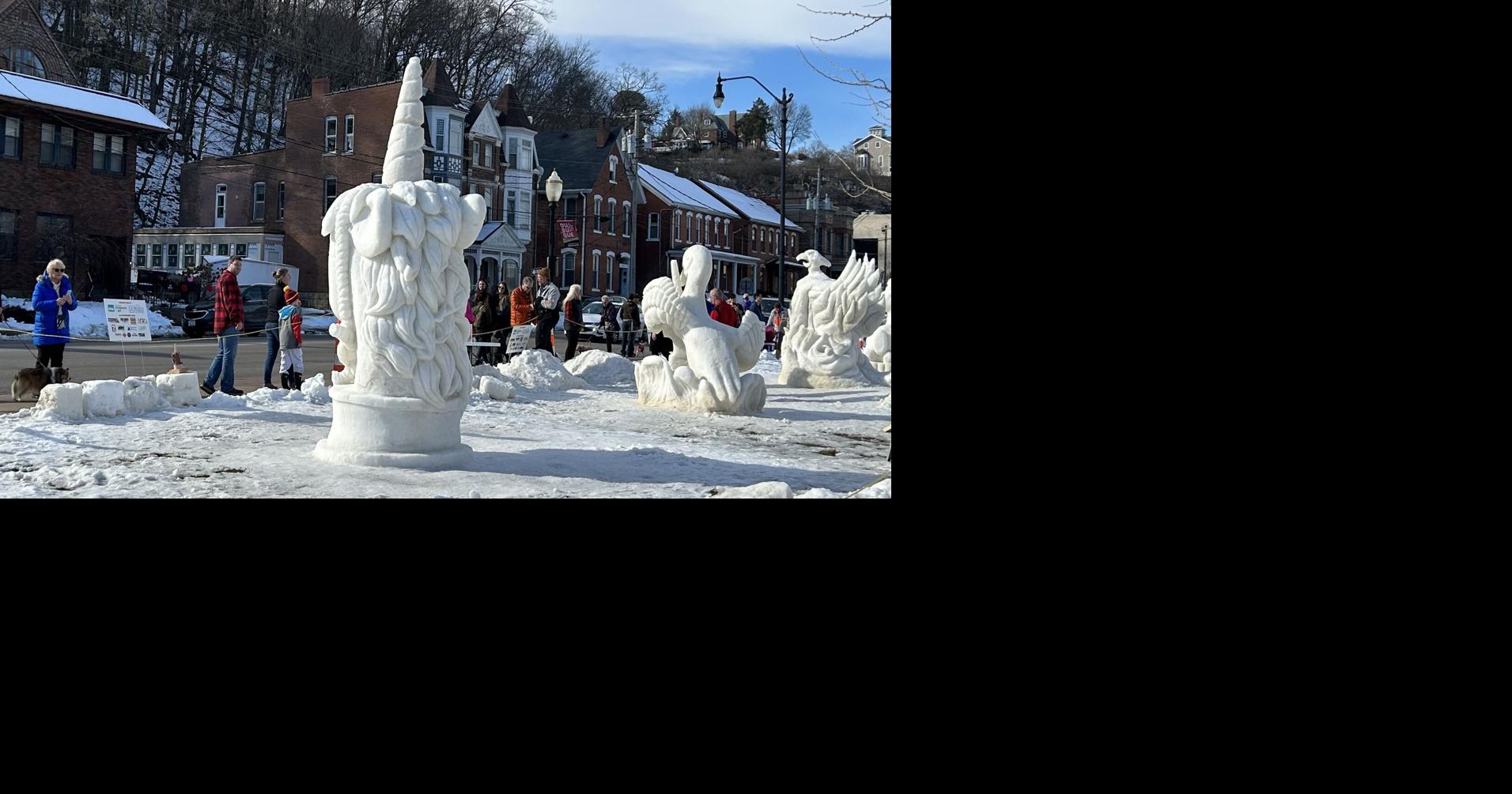 Artists overcome weather challenges to sculpt from snow in Dubuque ...