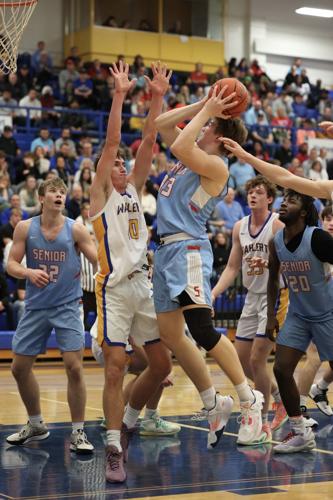 Boys prep basketball: Senior still unblemished after romp at Wahlert ...