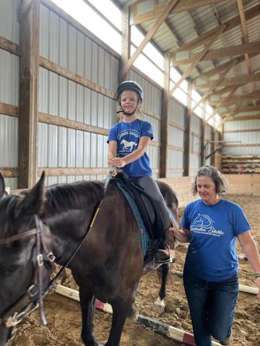 Person who makes a difference: Inspiration Stables volunteer helps kids ...