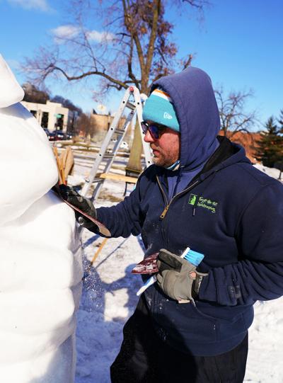 Person who makes a difference: Dubuque volunteer enjoys warming hearts ...
