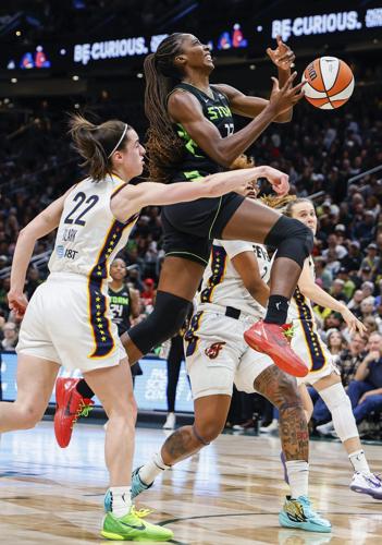 WNBA: Loyd scores a season-high 34 points as Storm cool off Clark ...