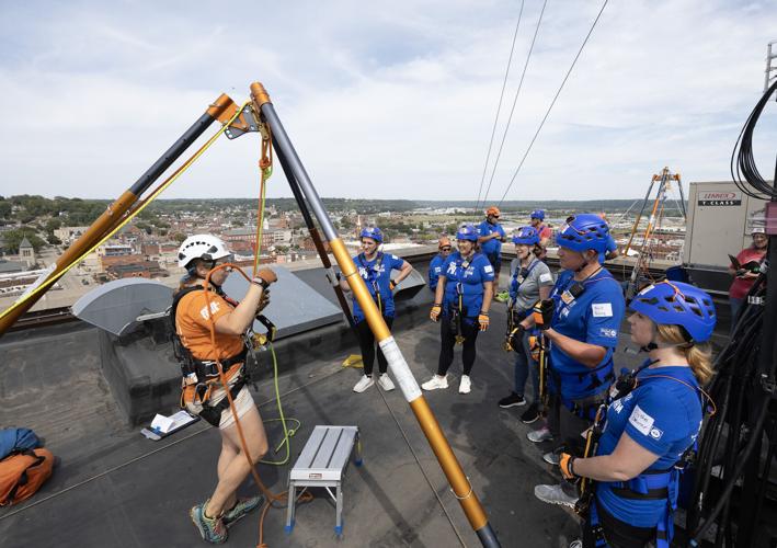 'A great cause': Dozens go Over the Edge in Dubuque fundraiser | Tri ...