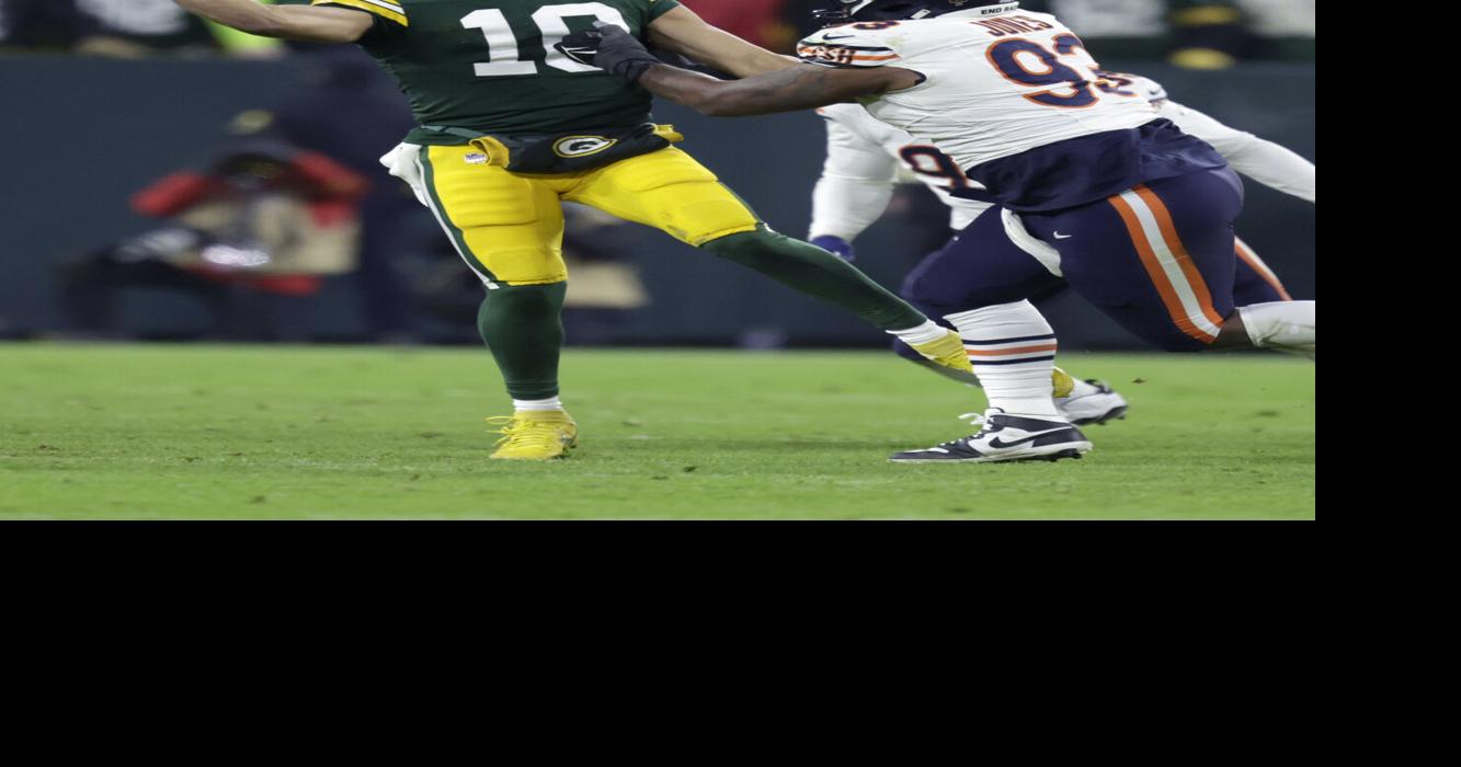 Love comes through as Packers beat Bears 17-9 to clinch a playoff berth ...