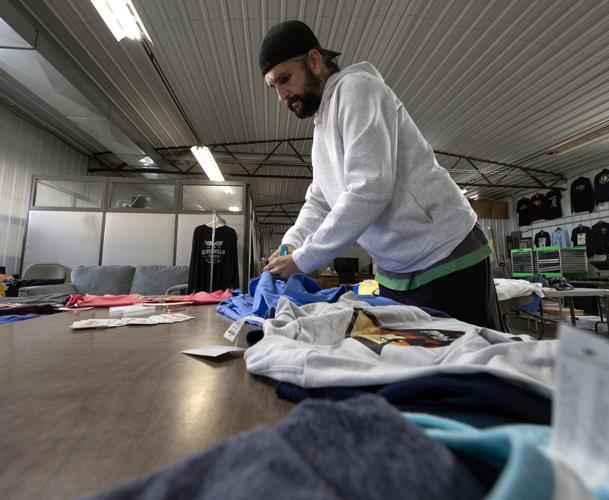 Dubuque Clothing Co. has customers looking (fish) fly | Features ...
