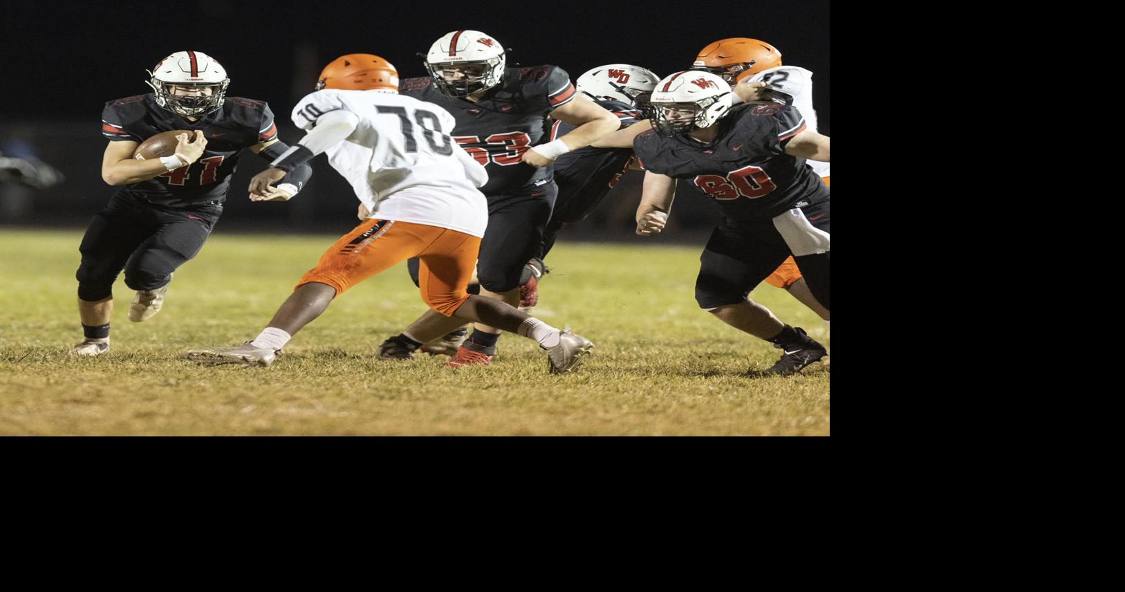 Prep football: Western Dubuque line clears way in romp of Waterloo East ...