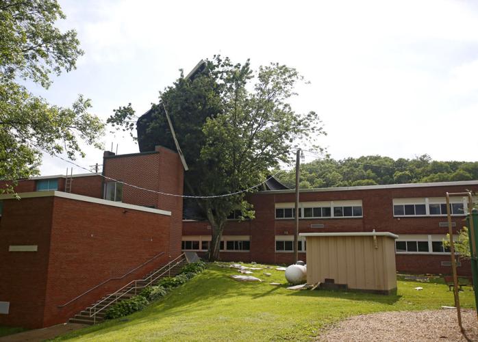 Update: Storm tears into Sageville School roof, cuts power and downs ...