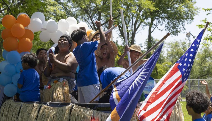 Newcomers, old hands celebrate Marshallese Constitution Day in Dubuque ...
