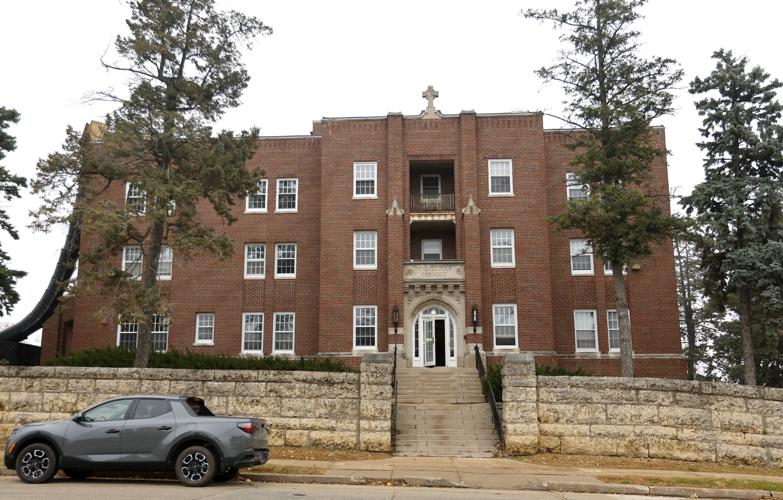 Nonprofit celebrates opening of offices in former Loras College ...