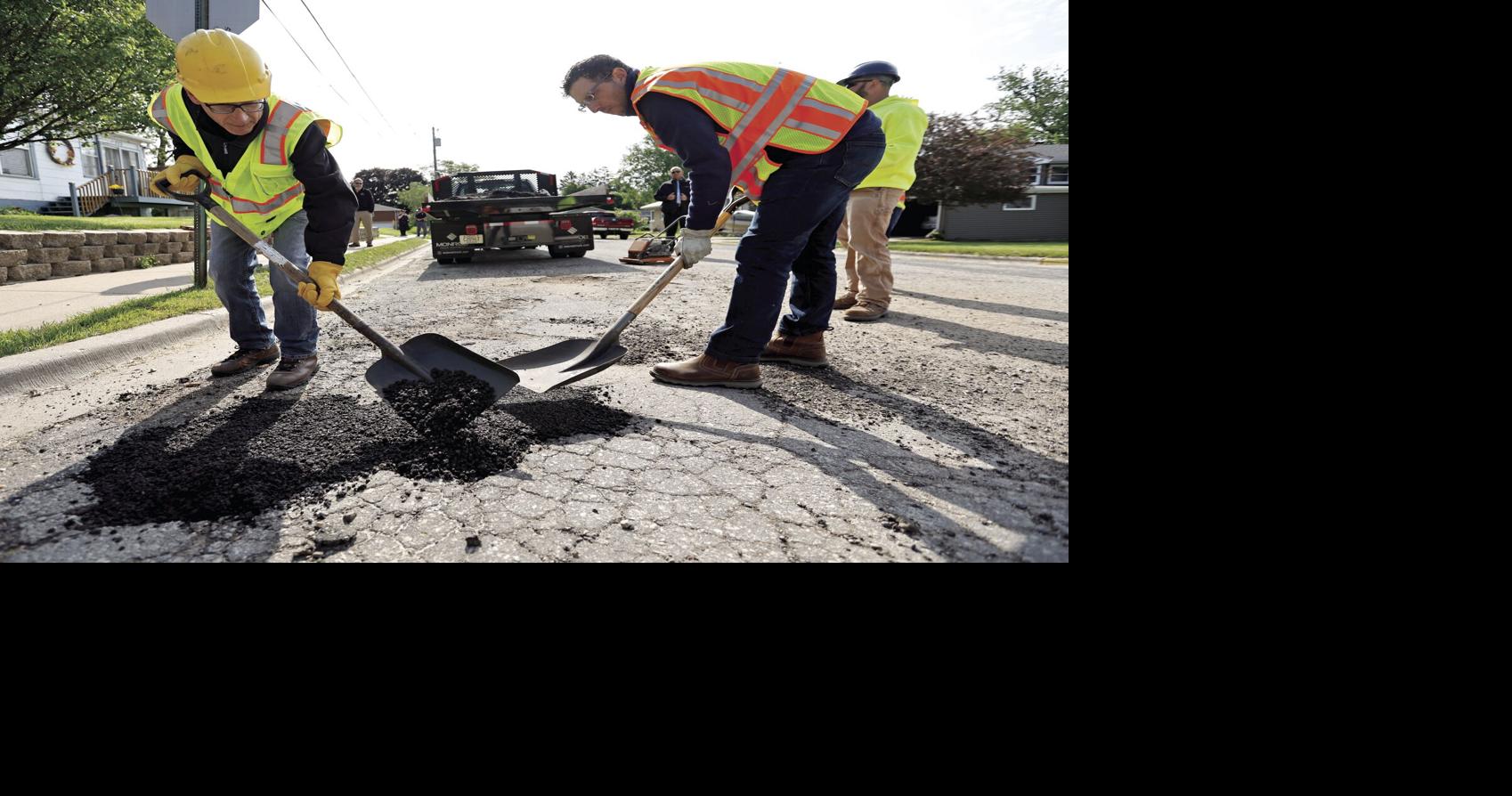 Evers fills potholes, stresses need for infrastructure improvements in southwest Wisconsin visit ...