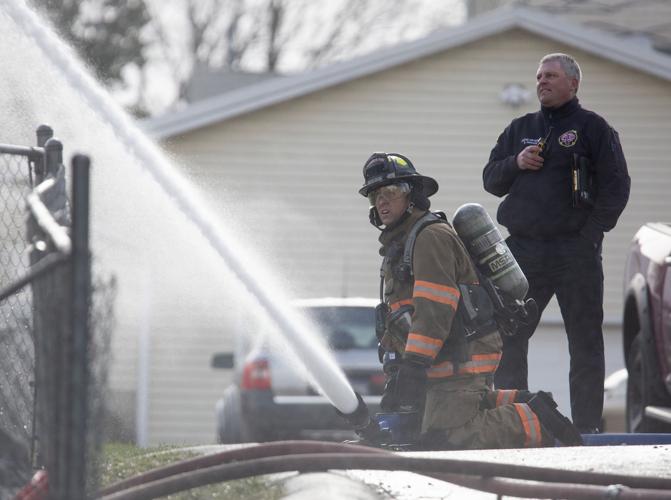 Thanks to passerby, 2 people, 1 dog safely escape Dubuque house fire ...