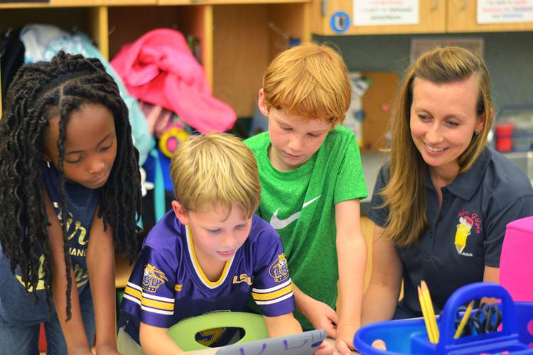 Seesaw gives engagement, learning balancing app to school | Zachary ...