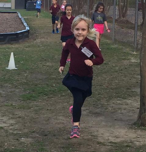 Baton Rouge FLAIM's Run Club ends year with check from mini marathon ...