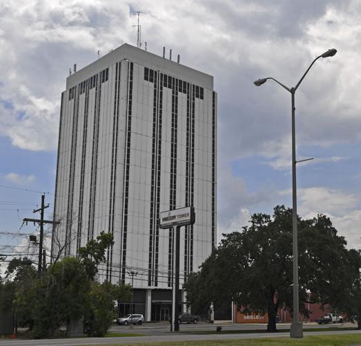 New owner looks to make Mid City Tower 'look like a shiny new dime ...