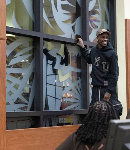 Travis Scott visits LSU for college merchandise collection ...