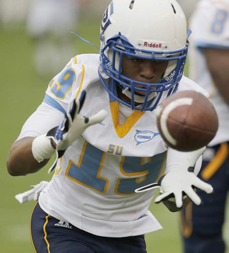 Photos: Southern sloshes its way to messy, but important, win at Texas ...