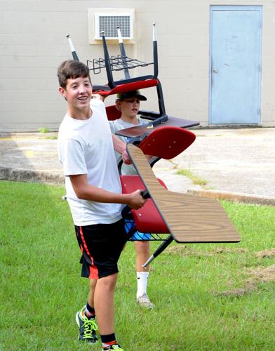 Volunteers answer plea for work day at West Feliciana High School | St ...