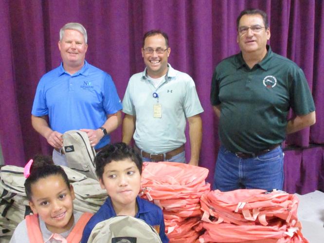 Just in time for start of school, students pick up school supplies from ...