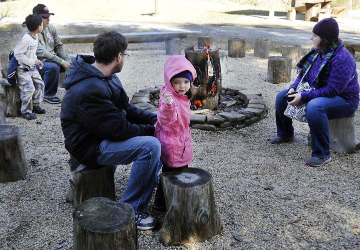 Tree planting a family affair, and tradition, at BR’s Burden Center ...