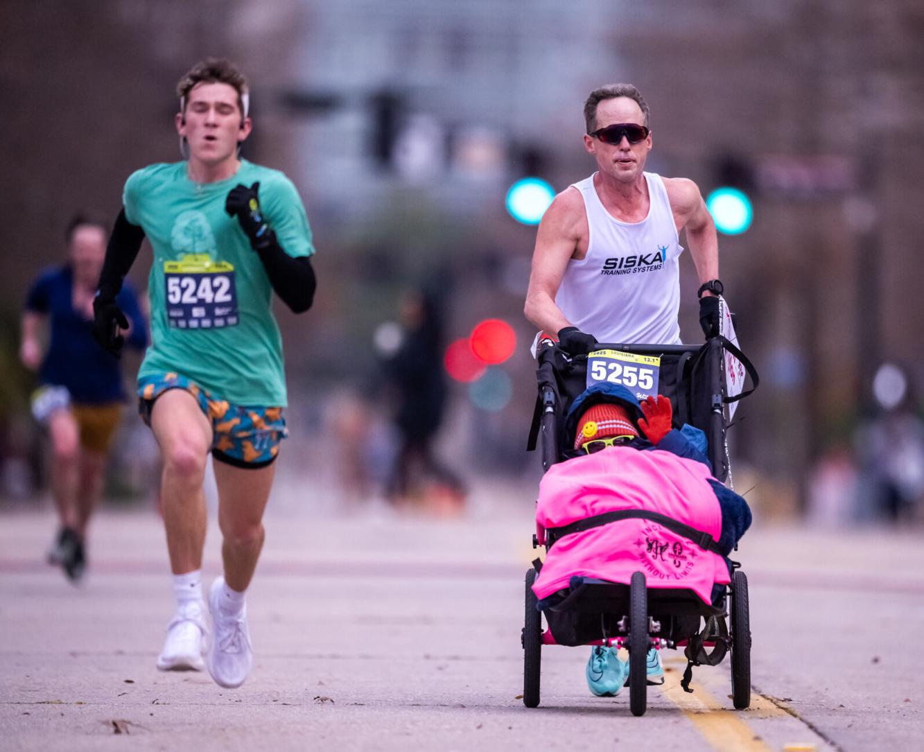 Photos: Thousands of runners brave the cold to compete in Louisiana ...