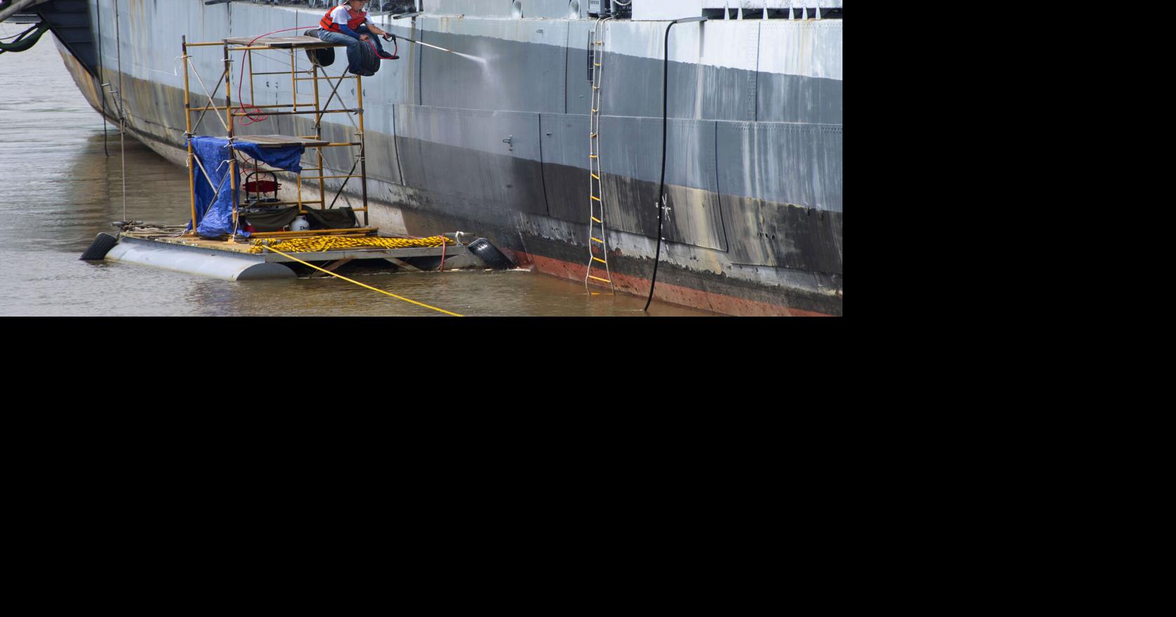 Photos: Workers use raft to give USS Kidd cleaning, washing and fresh ...