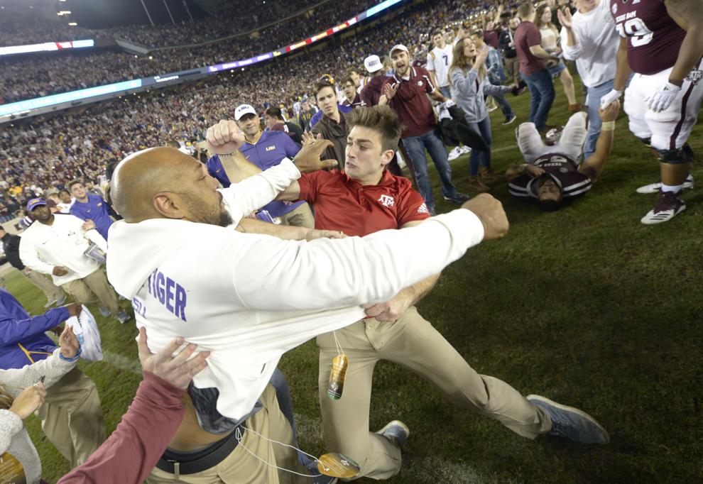 New LSU-Texas A&M video: Cole Fisher restrains former LSU assistant ...