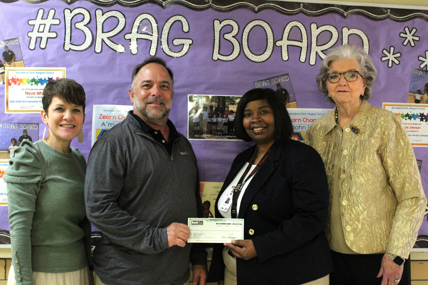 Woodland Park Magnet receives donation from BankPlus | Livingston ...