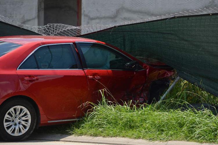 Photos: Vehicle hits fence | News | theadvocate.com