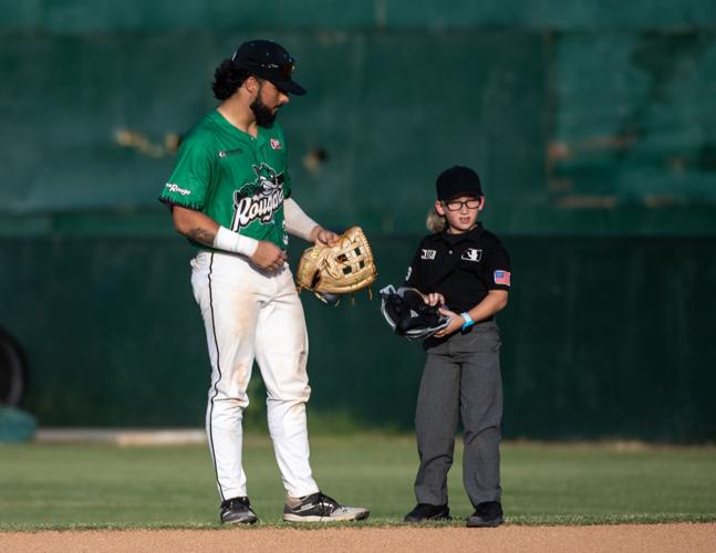 A 9-year-old Louisiana baseball umpire is a hit. See the photos of him ...