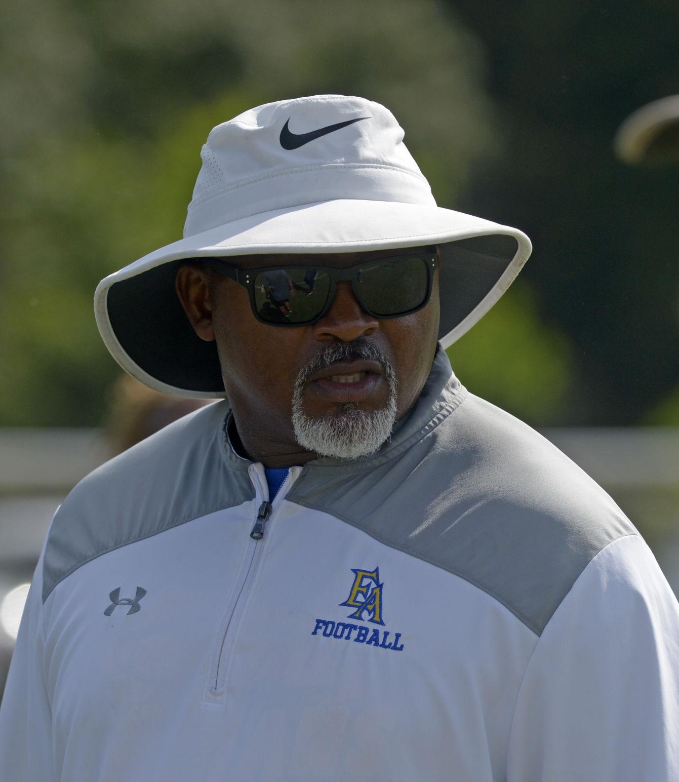 Front line of change: EAHS coach Darnell Lee traces offensive line ...