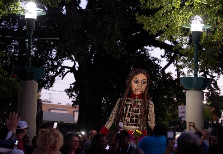 Little Amal, a 12-foot puppet of a Syrian refugee, visits Lafayette ...