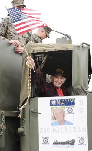 100-year-old Navy veteran rides as grand marshal in Walker's annual ...