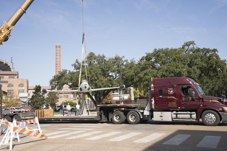 Photos: T-33 aircraft relocated, gets new home in different area of LSU ...