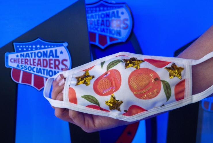With its 'Peach Pandemic,' cheerleading team is raising money for ...