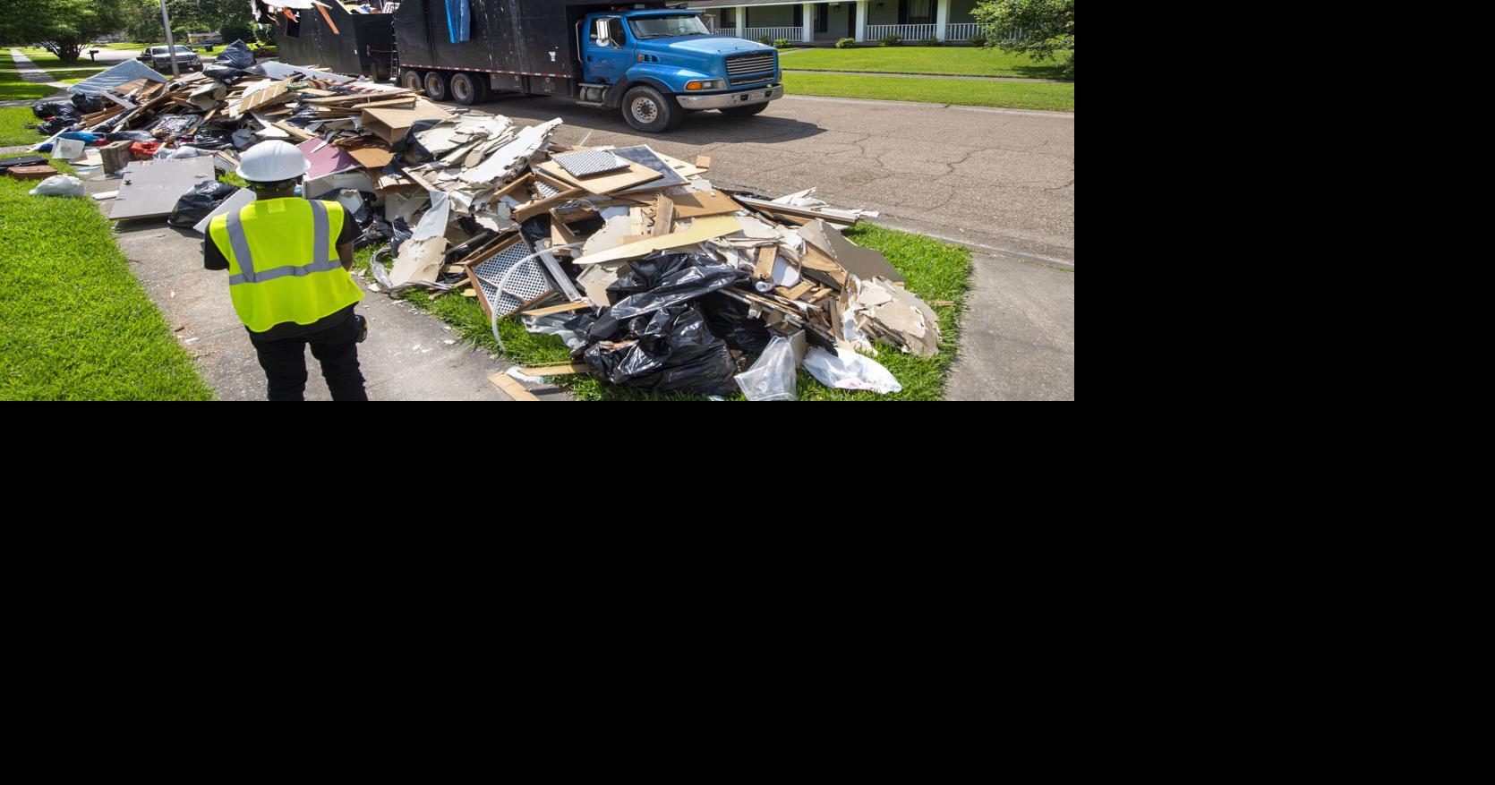 A 10-foot pile on Tiger Stadium's field: That's how much flood debris ...