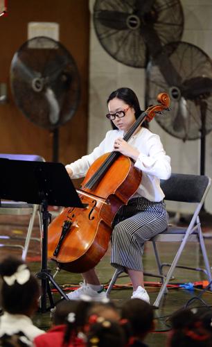 Photos: Composer Eric Genuis performs and speaks at Truman Early ...