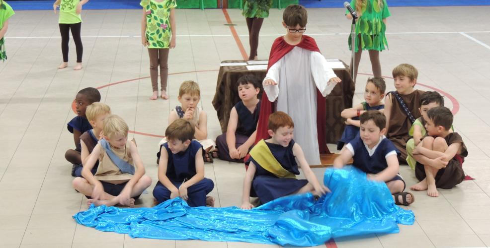 Holy Ghost Catholic School first graders perform Easter parade ...