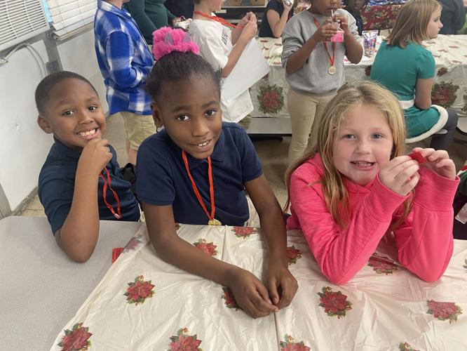 Slaughter Elementary programs celebrates hard work with holiday party ...