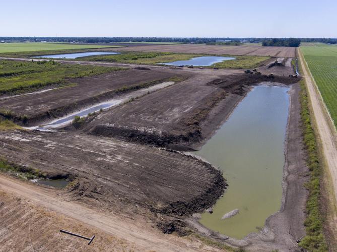 A long-awaited levee is being built. But what about the huge hole in ...