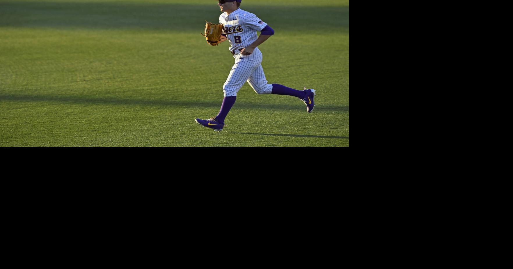 Former LSU first baseman Eddy Furniss watches 2 players close in on his ...