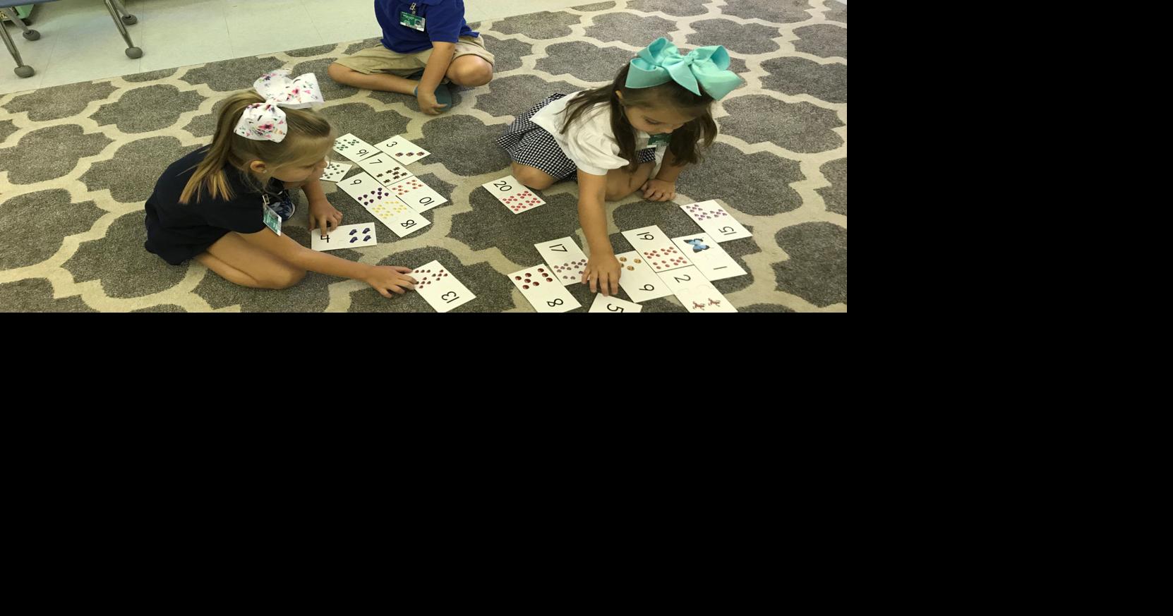 Bains Elementary students learn during literacy center lessons | St ...